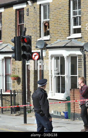 Police at the scene in Eastway, Hackney, east London, where a teenage ...