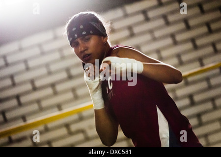 Geraldin Hamann, a young Colombian boxer, is seen during a muscular ...