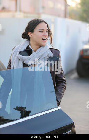 Michelle Rodriguez at her car after shopping at Fred Segal in West ...