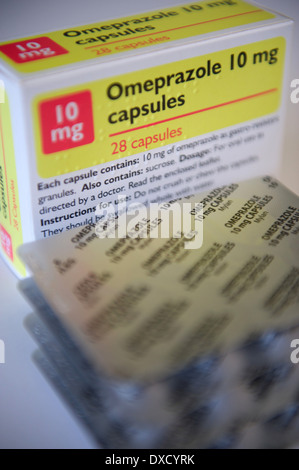 packs of omeprazole tablets Stock Photo - Alamy