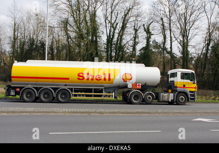 A Shell Petrol tanker traveling along a road in Coulsdon, Surrey ...