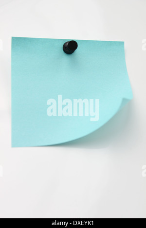 Blue Sticky Note With Blue Push Pin Stock Photo - Alamy