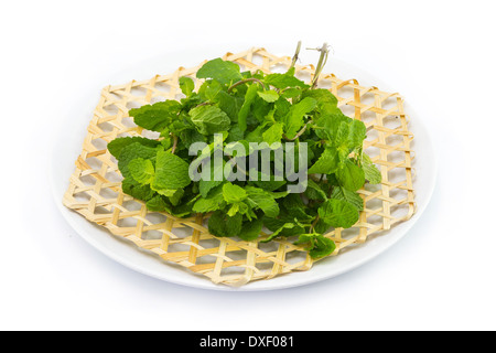 Pepermint on dish white background Stock Photo - Alamy