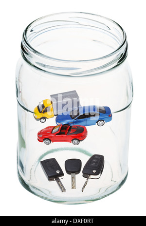 three new cars and keys in open glass jar Stock Photo - Alamy