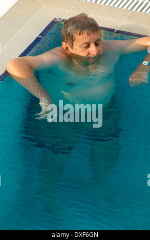 Fat man in the swimming pool Stock Photo - Alamy