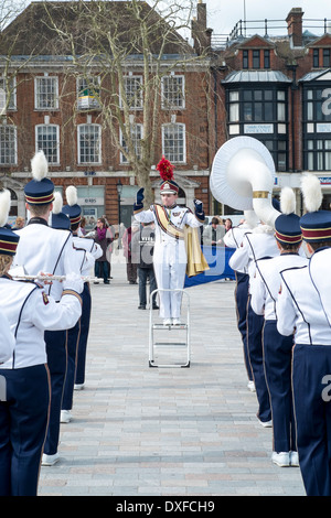 American marching band leader conductor standing on steps conducting ...