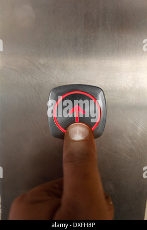 Button outside an elevator or lift Stock Photo - Alamy