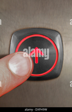 Button outside an elevator or lift Stock Photo - Alamy