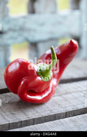 Red Romano Pepper On Wooden Surface Stock Photo - Alamy