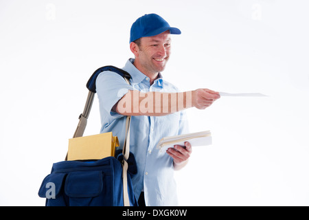 Mailman delivering mail Stock Photo - Alamy