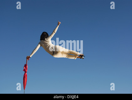 Woman clicking heels Stock Photo - Alamy