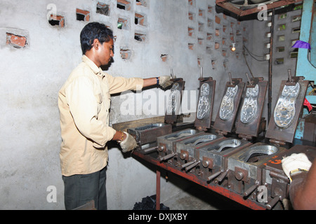 Shoe makers working making shoes in urban village, District Hazaribaug ...