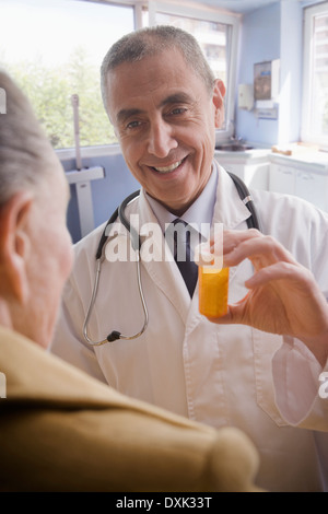 Doctor discussing over prescription with patient at hospital Stock ...