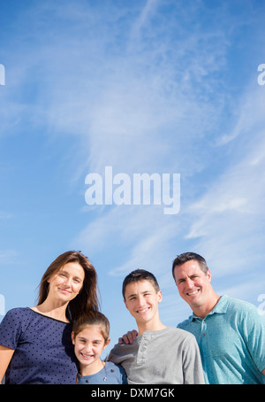 happy boy smiling under blue sky Stock Photo - Alamy