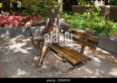 Statue of Benjamin Franklin sitting on a chair, University of ...