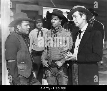 THOMAS MITCHELL as Pat Garrett WALTER HUSTON as Doc Holliday and JULIAN ...