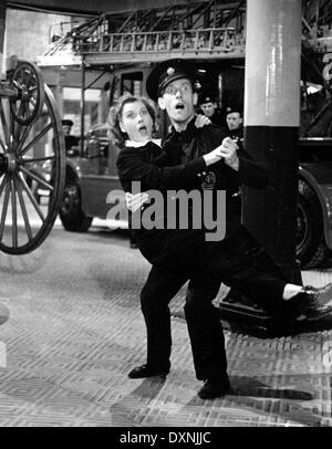 THE BELLS GO DOWN, Tommy Trinder (center), Philip Friend (right), 1943 ...