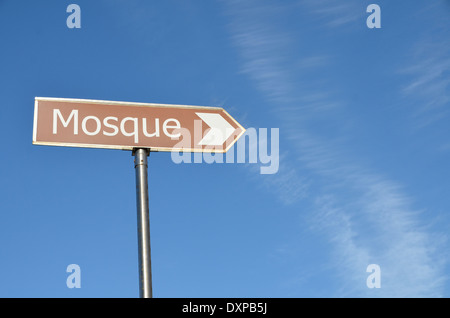 Mosque direction sign against a blue sky Stock Photo - Alamy