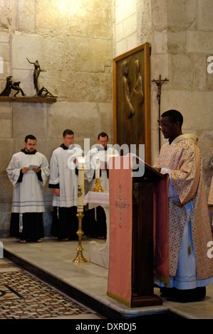 A Franciscan friar praying in Chapel of Mary Magdalene inside the Stock ...