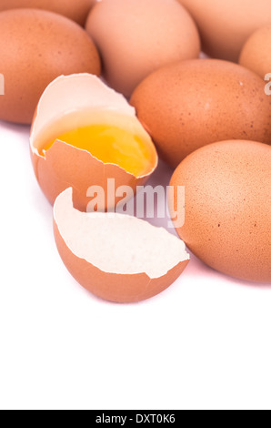 White chicken eggs with open chocolate egg table Stock Photo - Alamy