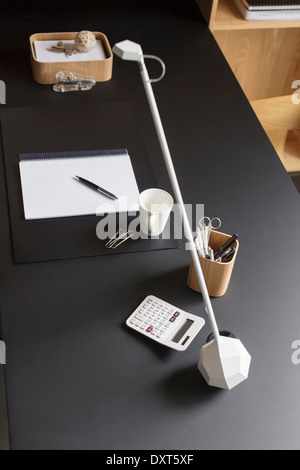 Modern workplace with cup of coffee on wooden table Stock Photo - Alamy
