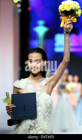 Beijing, China. 30th Mar, 2014. Champion Geng Xuan (C), runner-up Wang ...