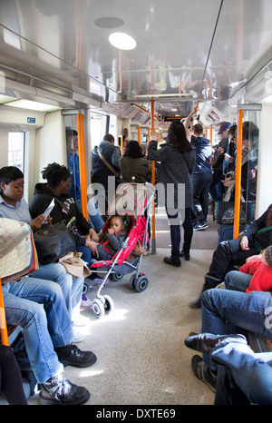 Passengers inside Overground carriage, London England United Kingdom UK ...