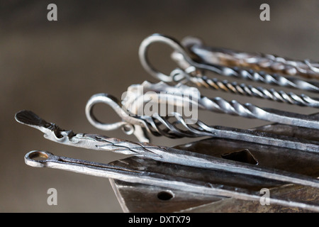 Objects made from iron by blacksmith Stock Photo - Alamy