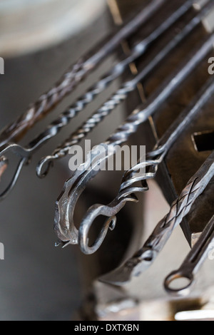 Objects made from iron by blacksmith Stock Photo - Alamy