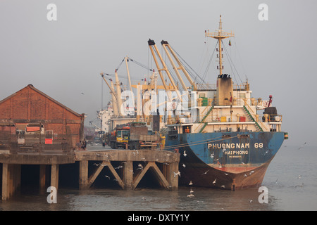 Yangon (Rangoon): Yangon River, cargo ship, port crane of Bo Aung Kyaw ...