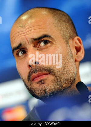 Bayern's head coach Pep Guardiola complains to the assistant referee ...