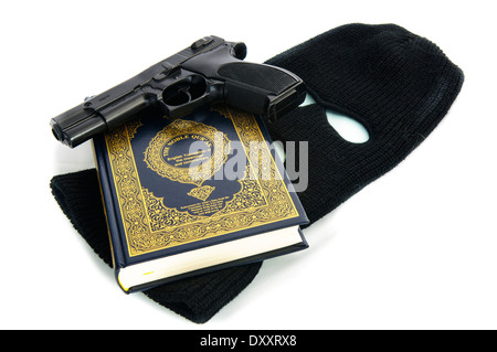 Handgun sits on top of an open Qu'ran - signifying radicalism and ...