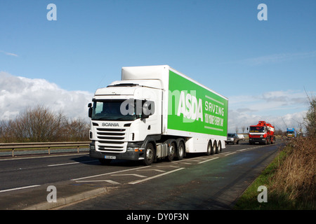 Asda supermarket delivery lorry and trailer overtaking a similar ...
