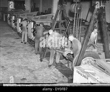 Assembling the bodies on AEC bus chassis, 1937 Stock Photo - Alamy