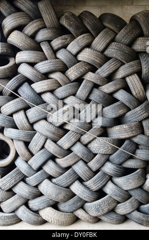 A neat stack of used car tyres awaiting recycling, UK Stock Photo - Alamy