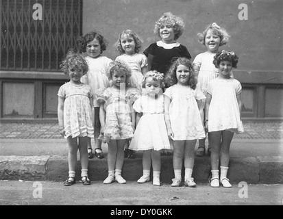 A 1934 photograph by Sam Hood showing children at a Christmas party ...