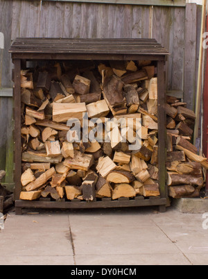 Wood store, firewood, spruce wood Stock Photo - Alamy