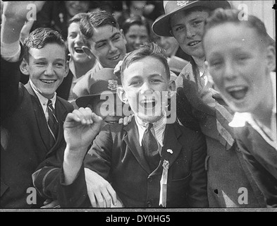 A 1935 photograph by Sam Hood showing a young diver in mid-air as he ...