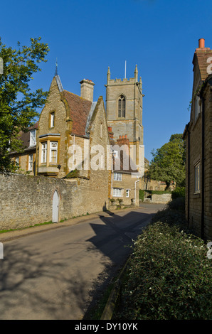 The pretty village of Grendon, UK; houses built of mellow stone with ...
