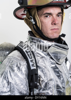 Male firefighter in high temperature aviation fuel firefighting uniform ...