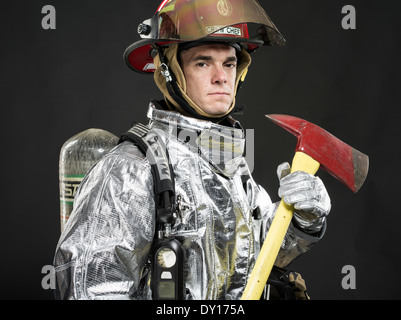 Male firefighter in high temperature aviation fuel firefighting uniform ...