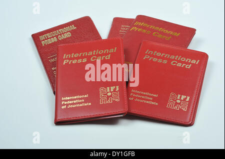 Several press credentials with light background. Those credentials are ...