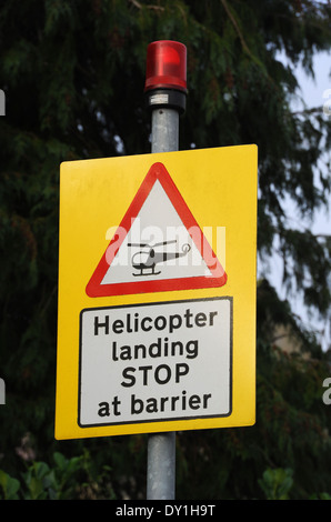 Helicopter warning sign at helipad landing area Stock Photo - Alamy