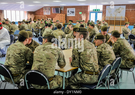 Soldiers sit around tables in a barracks mess Stock Photo - Alamy
