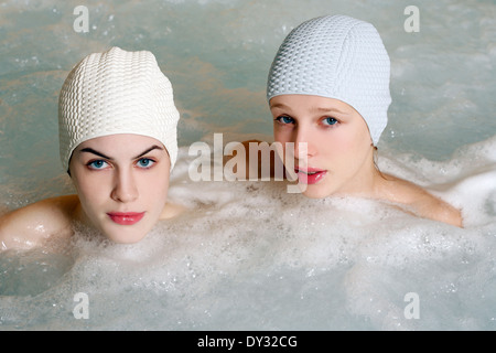 Two women in jacuzzi at a spa Stock Photo - Alamy