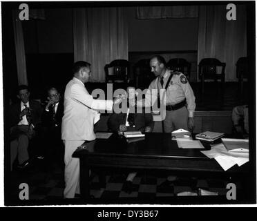 A historical photograph showing the oath ceremony of the Šlander ...