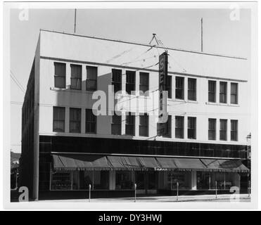 An old Sears Roebuck & Company store sign on a art deco facade Stock ...