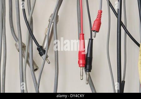 Old computer cables used to connect peripheral devices. Plugs and ...