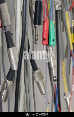 Old computer cables used to connect peripheral devices. Plugs and ...