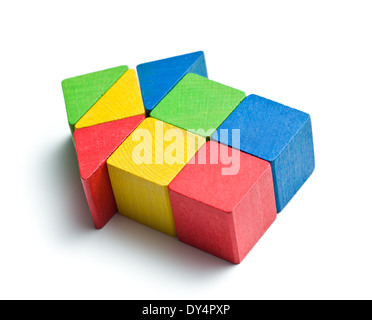 House made of wooden blocks on blue background. Building a home concept ...